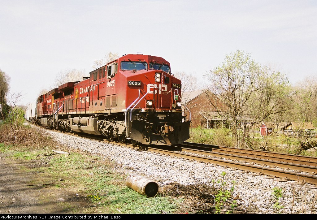 CP 9625 leads this eastbound past the mules